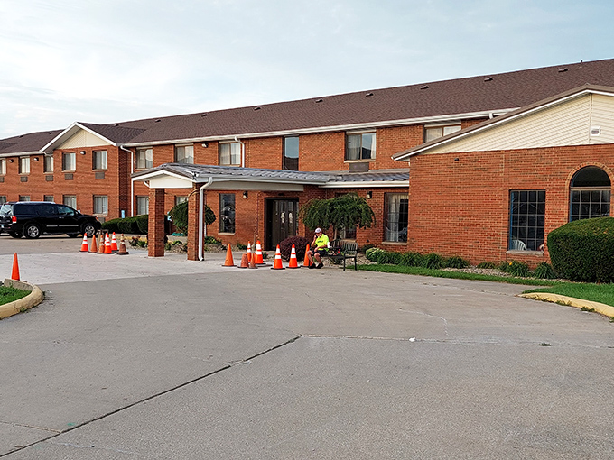The Best Western might not win architectural awards, but those orange cones suggest they're improving&mdash;just like the rest of us, always under construction.