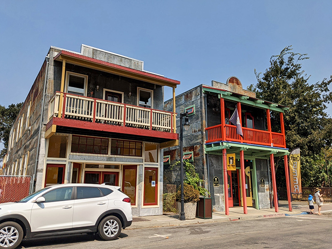 Historic buildings with colorful balconies showcase Isleton's unique architectural character, where every weathered brick tells a story of Delta resilience.