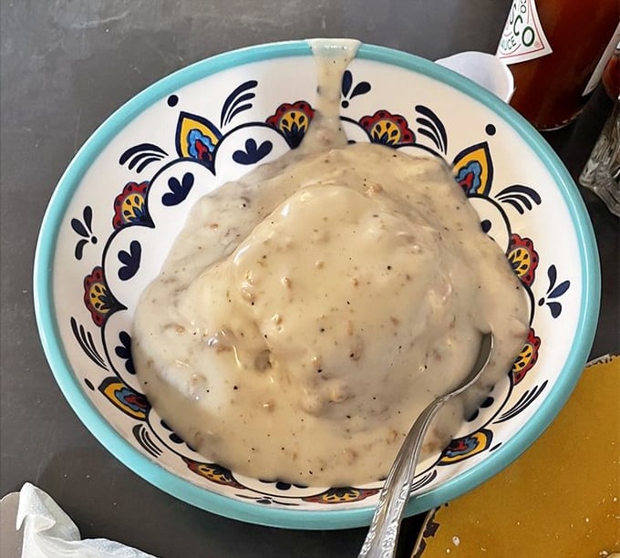 Biscuits and gravy – the breakfast dish that hugs you from the inside. This creamy, peppery blanket of comfort makes Monday feel like Saturday.