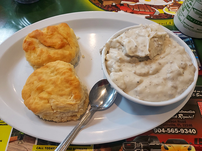 Biscuits so flaky they should come with a warning label, paired with gravy that's clearly been perfected over thousands of mornings.