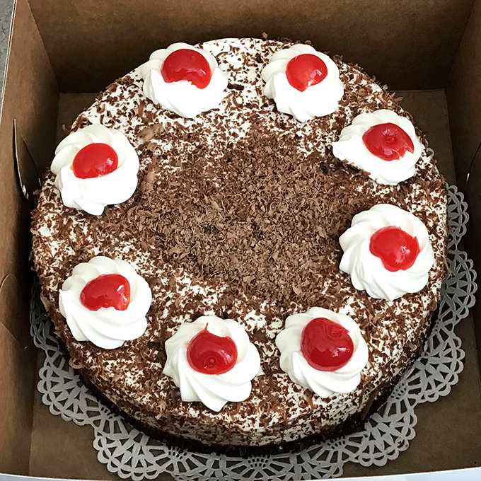 This Black Forest Torte isn't just cake&mdash;it's a German cultural ambassador with diplomatic immunity from your diet. Those cherries are practically winking at you.