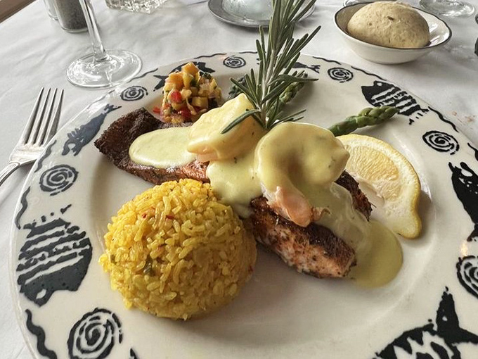 Blackened salmon with hollandaise that makes you want to write poetry. The rice pilaf is the unsung hero on this artistic plate.