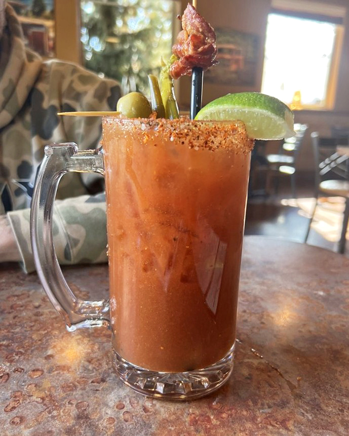 A Bloody Mary that looks like it could cure whatever ails you, garnished with enough vegetables for lunch.