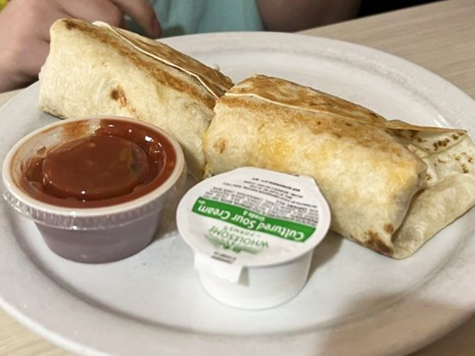 The breakfast burrito: where morning ingredients find themselves wrapped in a warm tortilla hug, ready for their salsa dance partner.