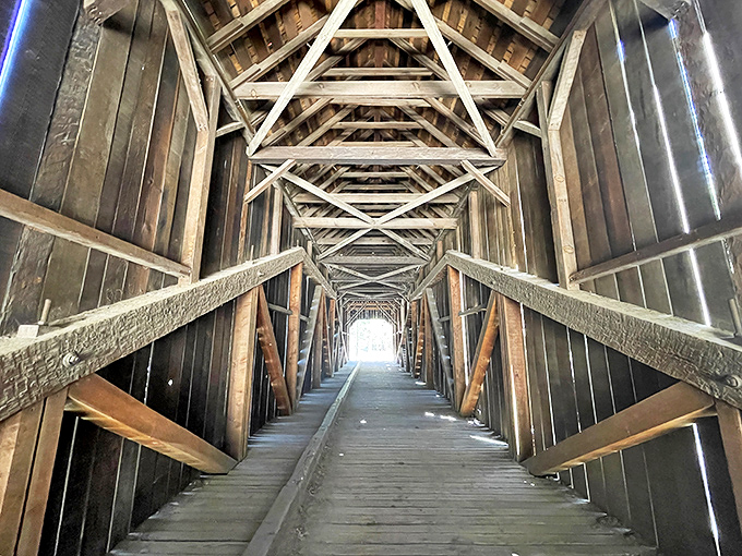 Another perspective of the interior's hypnotic geometry &ndash; it's like being inside a giant wooden puzzle.