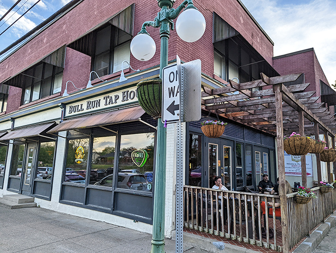 Bull Run Tap House's inviting patio creates that perfect urban oasis where craft beers and conversations flow with equal enthusiasm.