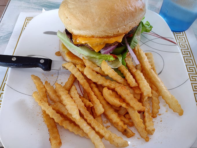 A burger that requires both hands and several napkins, accompanied by perfectly crispy crinkle-cut fries. Lunch doesn't get more satisfying than this.