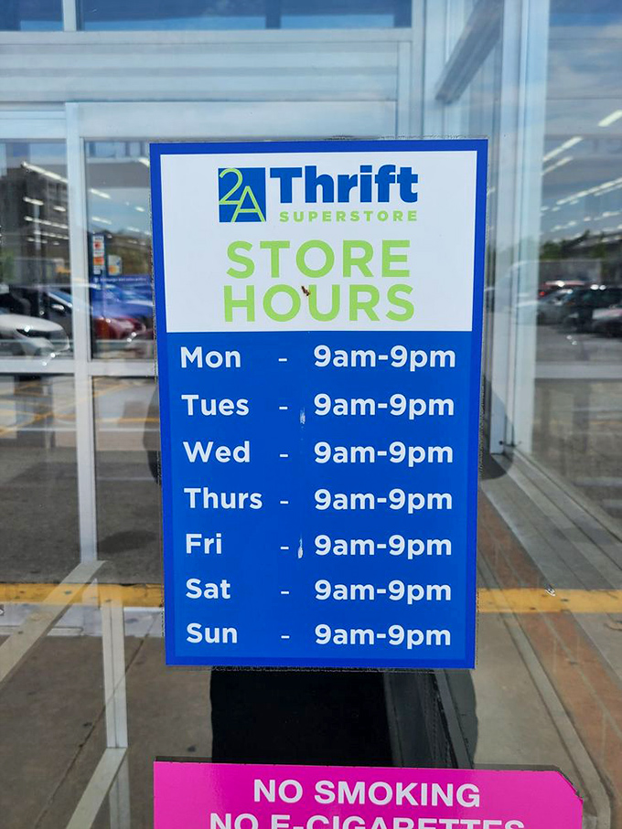 The hours sign &ndash; a beacon of hope for night owls and early birds alike. Thrifting waits for no one!