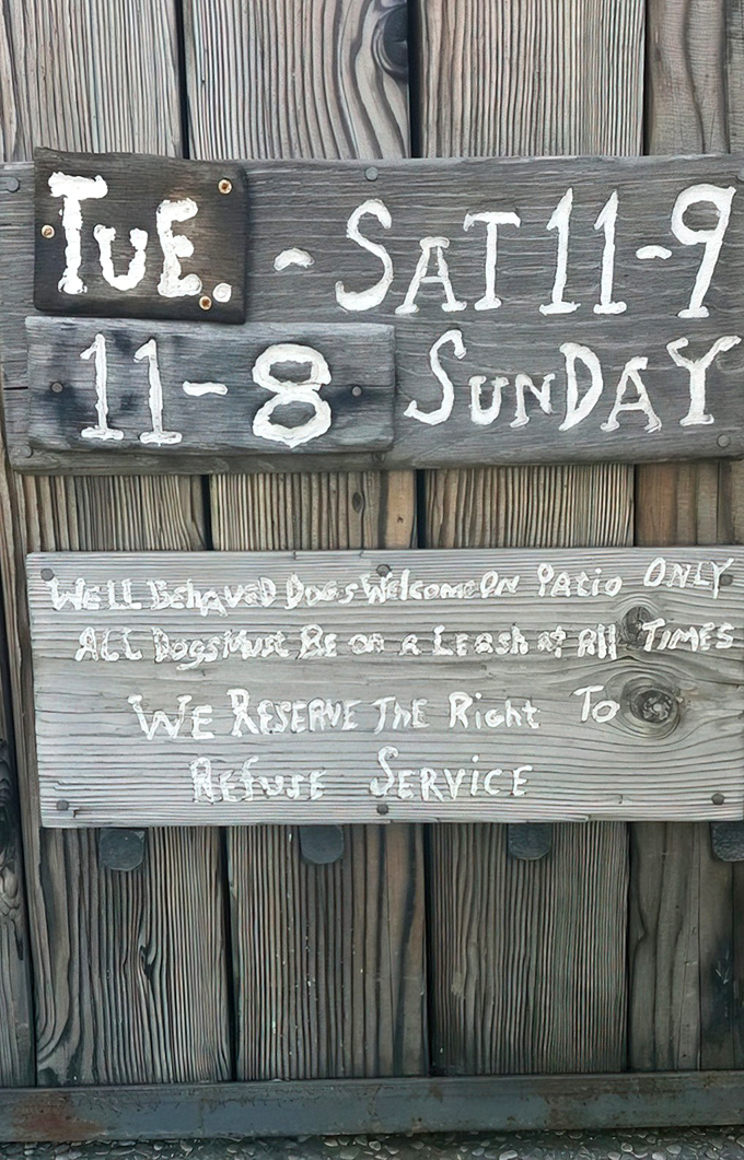 Hours posted with that charming handwritten touch that says, "We're serious about our barbecue, not our graphic design."
