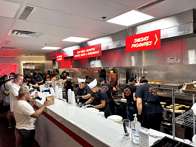 A bustling kitchen during peak hours&mdash;where skilled hands work with practiced precision to feed Austin's seemingly insatiable taco appetite.