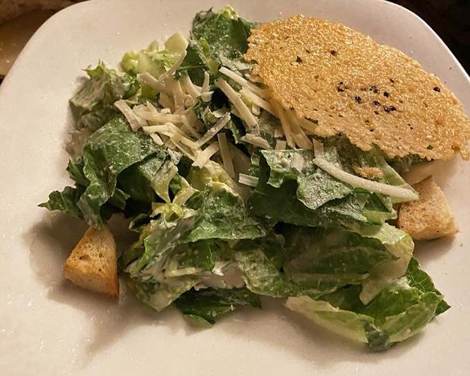 A Caesar salad that Julius himself would approve &ndash; crisp romaine, sharp Parmesan, and that golden Parmesan crisp crown.