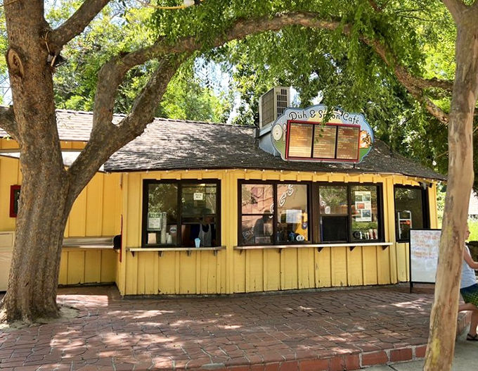 This charming yellow cafe serves up snacks under shady trees. Because even fairytale adventurers need refueling between dragon-slaying expeditions.