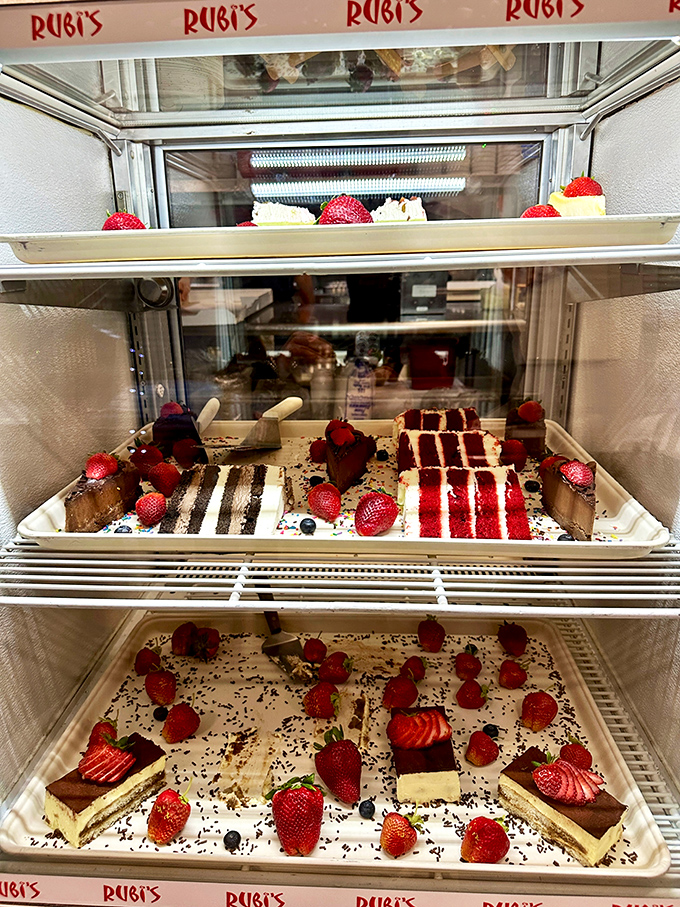 The dessert case that ruins diets and creates happiness. Those strawberry-topped treasures aren't just sweets&mdash;they're the reason pants have elastic waistbands.