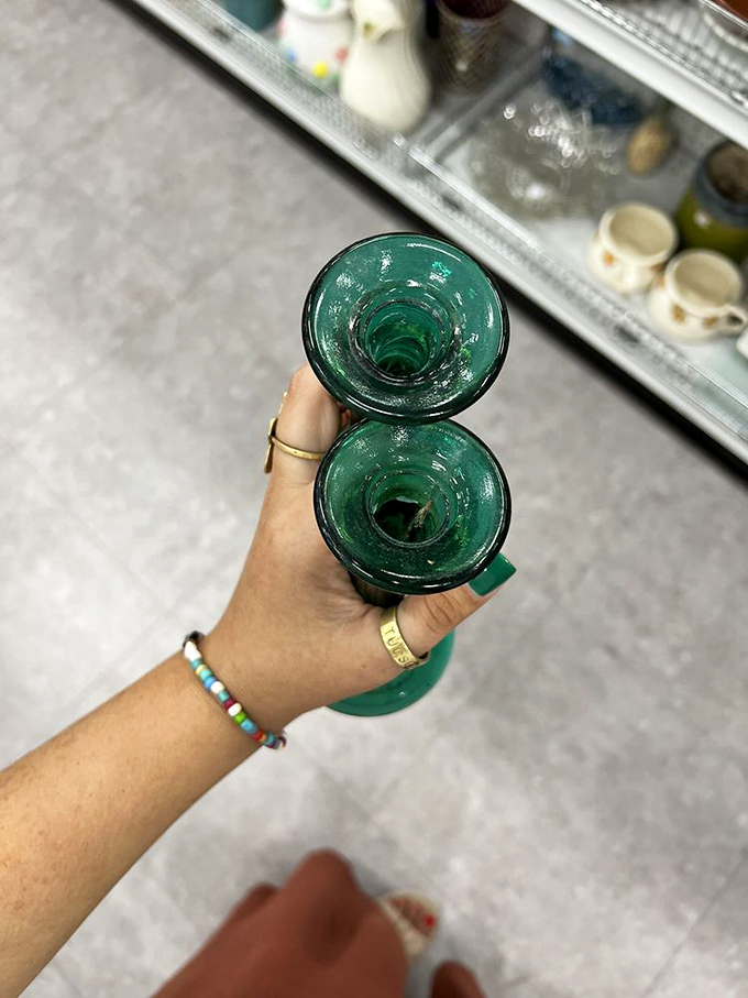 Emerald green glassware catches the light and a shopper's eye&mdash;vintage vessels ready to elevate your next dinner party.