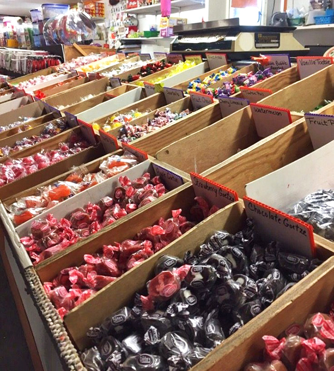 Candy organized with military precision. Each wooden compartment holds sweet memories&mdash;and future cavities&mdash;sorted by color and childhood nostalgia.