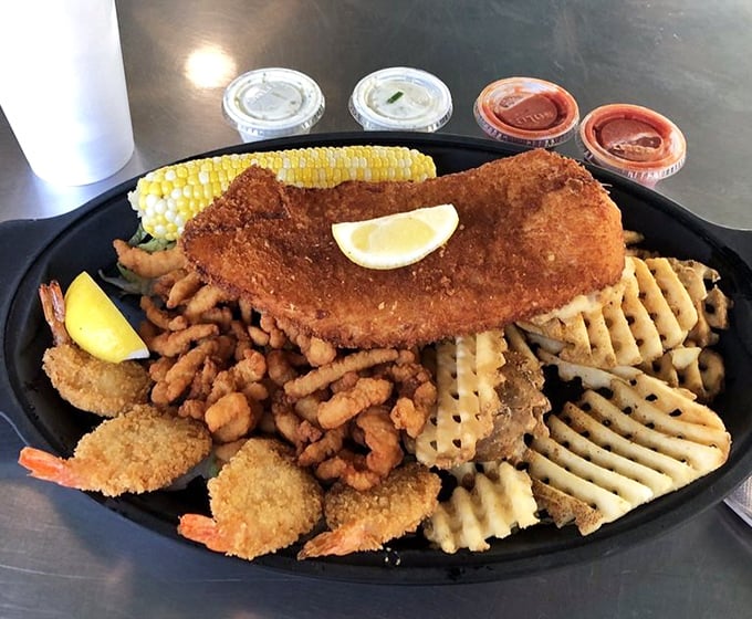 The Captain's Platter doesn't just feed you—it tells a story of the sea with each golden-fried morsel. Sharing optional but not recommended.