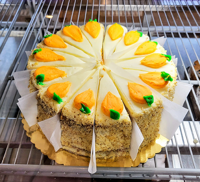 Carrot cake with cream cheese frosting and decorative carrots&mdash;because sometimes you need to pretend your dessert has nutritional value.