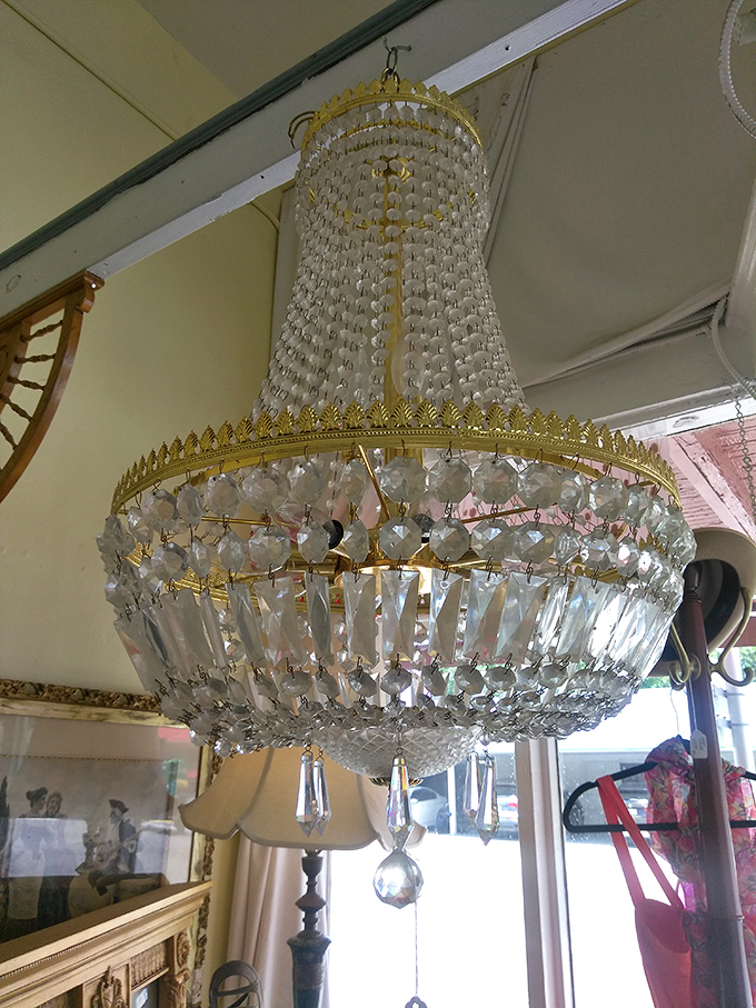 Crystal chandeliers that once illuminated formal dinners now wait for second acts. This beauty could make even a bowl of cereal feel like a state dinner.