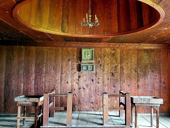 Simple wooden benches beneath a soaring ceiling&mdash;this chapel interior reminds us that spiritual solace was essential on the colonial frontier.