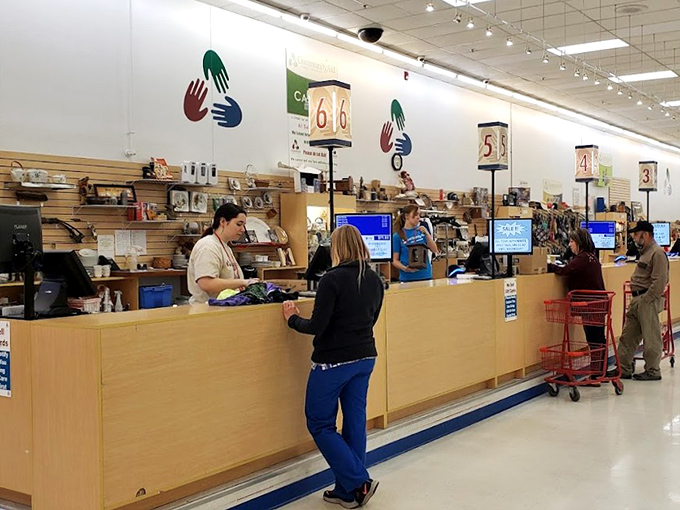 Checkout counters where treasures and cash part ways. The moment of truth in every thrifter's journey through bargain paradise.