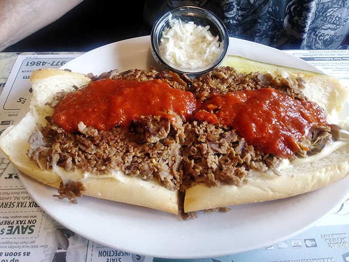 The cheesesteak that launched a thousand napkins&mdash;a glorious mess of meat, cheese, and sauce that demands your full attention and zero dignity.