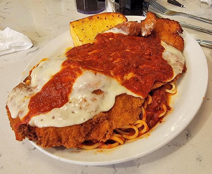 Chicken Parmesan that would make an Italian grandmother nod in approval. That sauce-to-cheese ratio deserves its own mathematical theorem.
