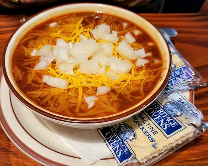 This isn't just chili&mdash;it's a warm hug in a bowl, topped with enough cheese and onions to make you temporarily forget your troubles.
