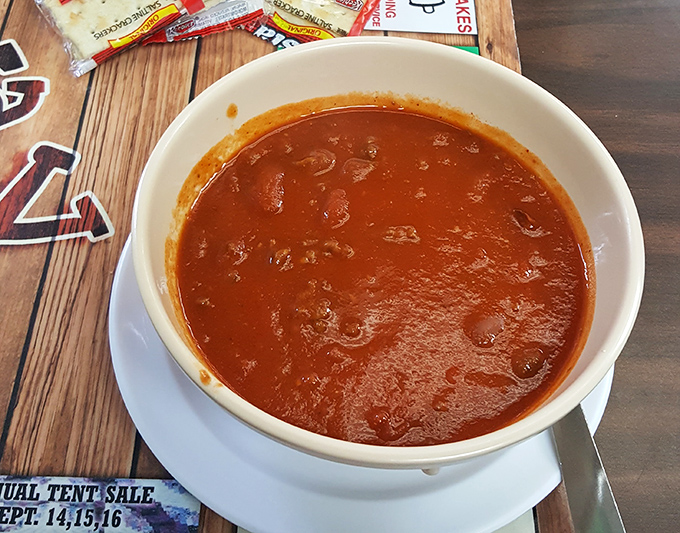 A bowl of chili that doesn't need fancy garnishes to make its point. This hearty, straightforward soup speaks the universal language of comfort.