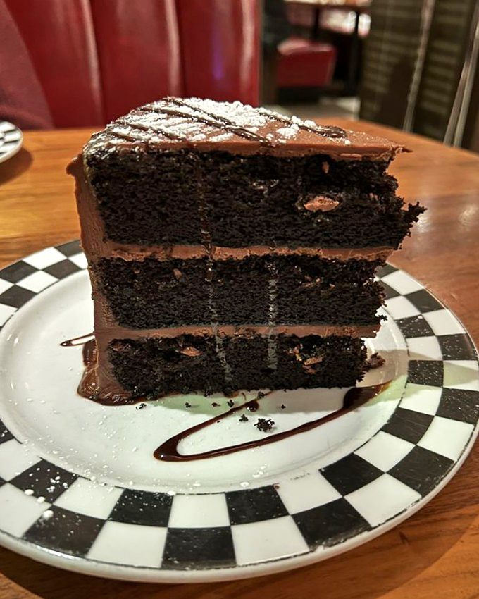 This chocolate cake doesn't just have layers&mdash;it has stories to tell, with each tier of dark decadence separated by frosting that deserves its own fan club.