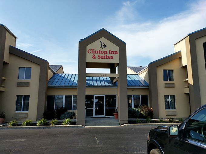 The Clinton Inn welcomes visitors with the architectural equivalent of a firm handshake – unpretentious, reliable, and surprisingly comfortable.