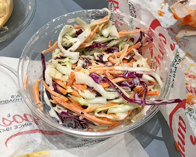 Crisp, colorful coleslaw that brings the crunch factor &ndash; the perfect cool counterpoint to the warm embrace of a hot cheesesteak.