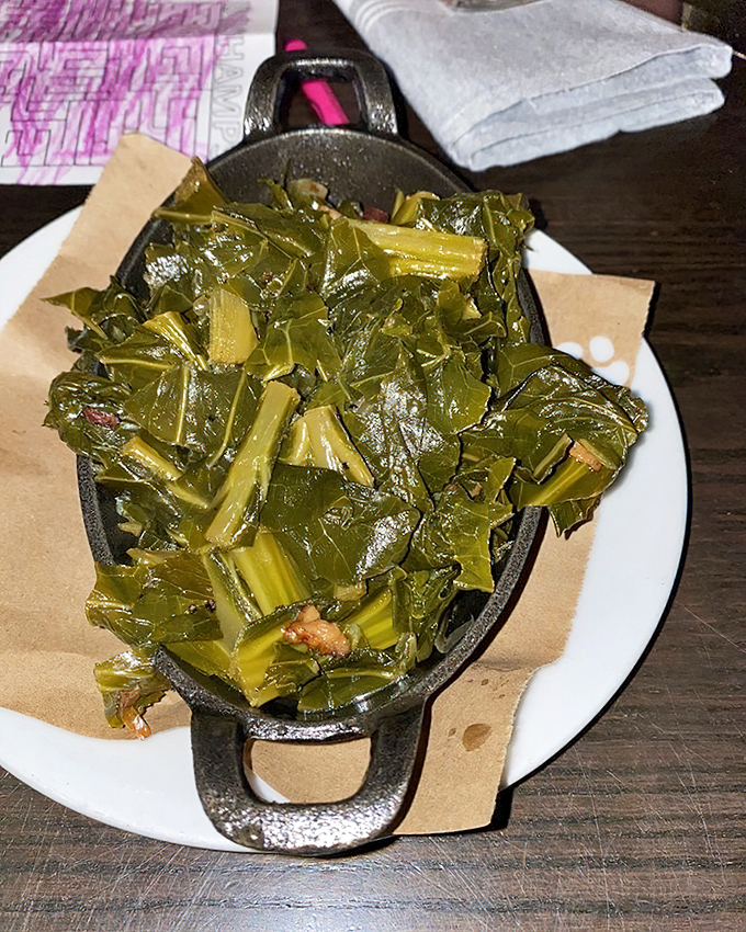 Collard greens done right&mdash;tender, smoky, and unapologetically Southern. The kind that make vegetable skeptics reconsider their life choices.