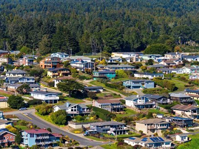 Trinidad's hillside homes cascade toward the Pacific like a colorful game of Tetris designed by someone who really loves ocean views.