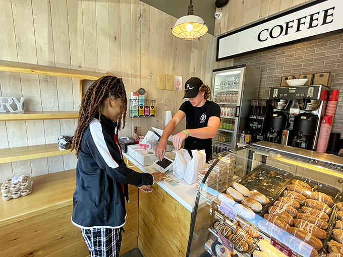 The moment of truth arrives at the counter, where decisions are made and donut dreams become delicious reality.