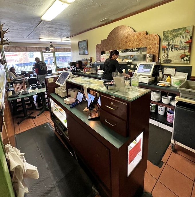 Where the magic happens&mdash;the counter where orders are called and plates emerge bearing comfort food that defies modern diet trends.