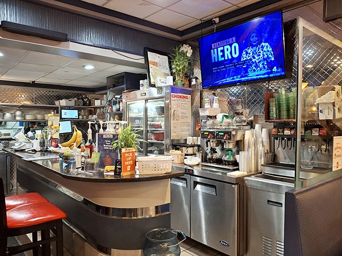 The counter's organized chaos reveals the heart of any great diner—where coffee stays hot, bananas ripen for splits, and regulars find their home.