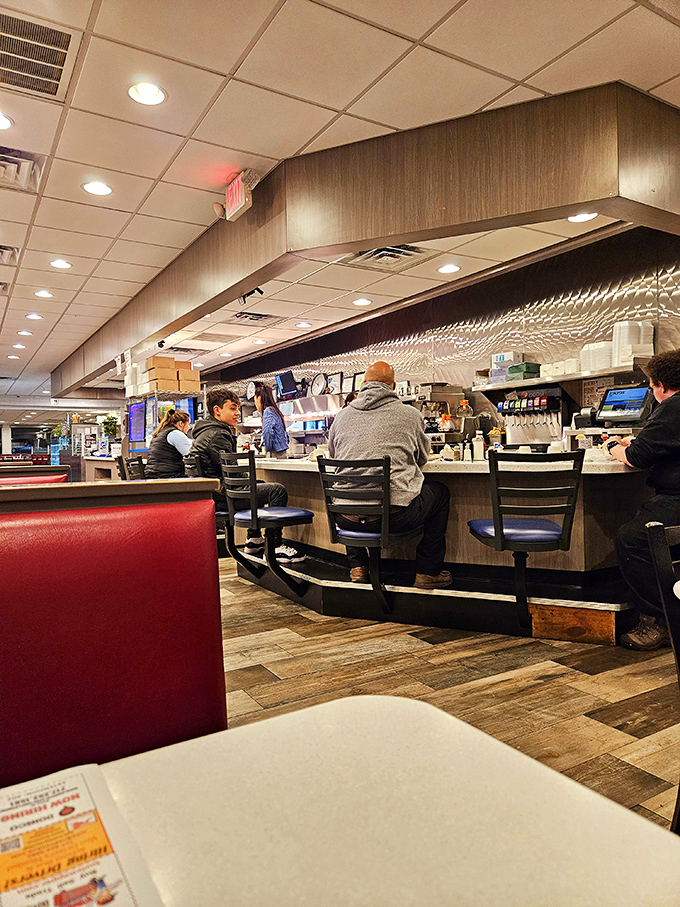 The counter&mdash;where regulars have worn grooves in the seats that match their exact dimensions after years of faithful patronage.
