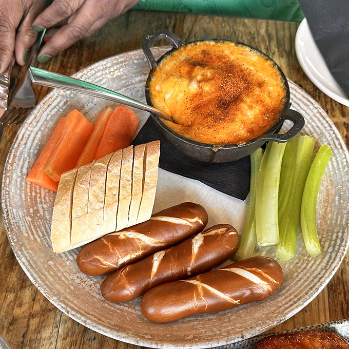 This isn't just crab dip&mdash;it's Maryland's soul in a cast-iron skillet. The pretzel bread and fresh vegetables are perfect vehicles for this molten masterpiece.