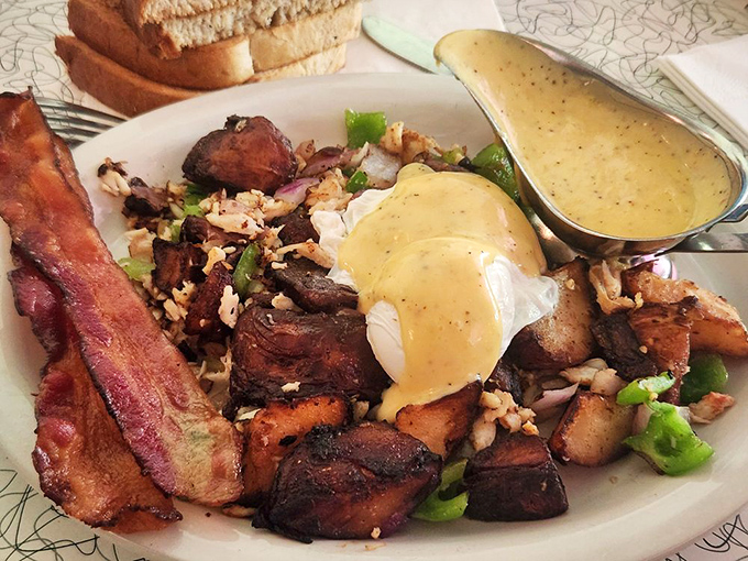 Breakfast reimagined&mdash;tender crab hash topped with perfectly poached eggs and hollandaise. Morning glory that would make hitting the snooze button a criminal offense.