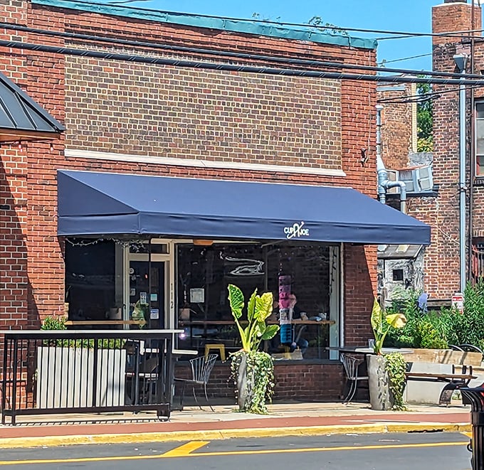 Cup-A-Joe's sidewalk seating offers the perfect perch for watching Hillsborough's daily parade unfold.