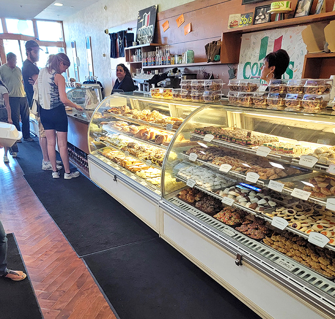 Customers line up with the patience of saints and the anticipation of children, knowing that Corbo's treats are worth every minute of the wait.
