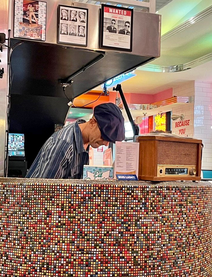 When your server moonlights as a DJ, dinner becomes a full production number.