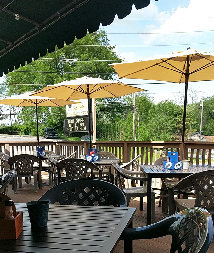 Umbrella-shaded deck tables offer the perfect vantage point for watching the world roll by &ndash; literally, on two wheels most of the time.