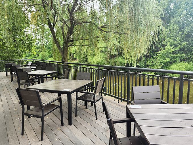 The outdoor deck offers breakfast with a side of nature&mdash;where weeping willows and fresh air enhance flavors better than any seasoning could.