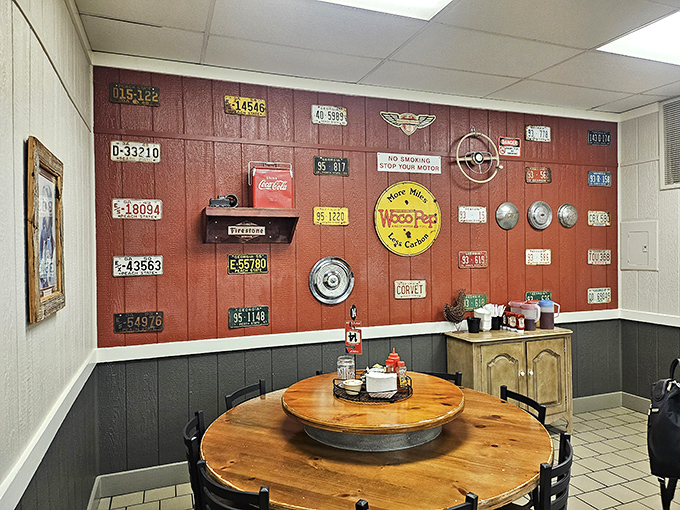 License plates and nostalgic signs create a museum of Americana on the walls&mdash;visual comfort food to accompany your actual comfort food.