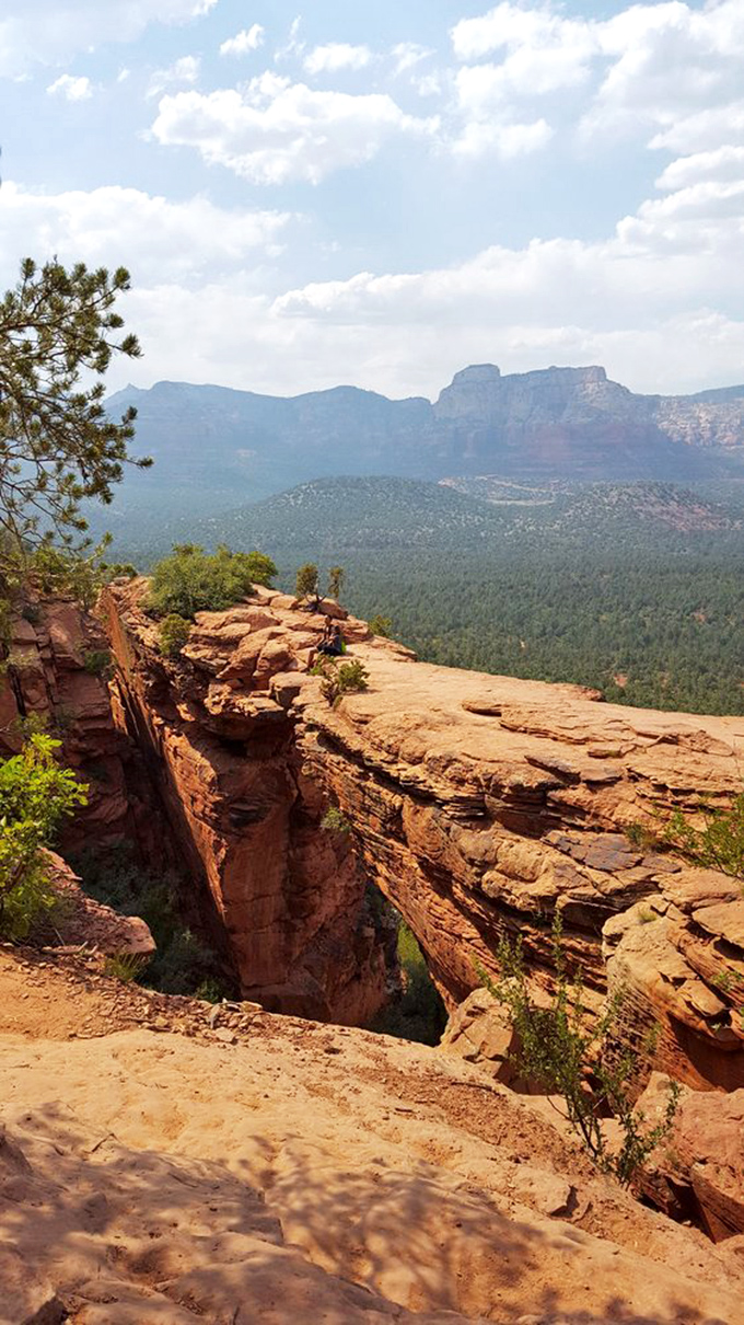 Devil's Bridge stretches across the canyon, daring hikers to test their nerve on nature's own suspension of disbelief.