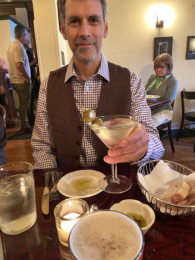 Happy diners savoring every bite prove that word-of-mouth recommendations never lie about quality food.