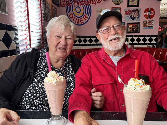 These aren't just customers enjoying milkshakes&mdash;they're living proof that some pleasures never go out of style, especially when topped with whipped cream and a cherry.