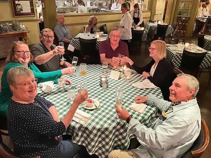 Nothing says "life is good" quite like clinking glasses with friends around a table where memories are made between bites of exceptional food.