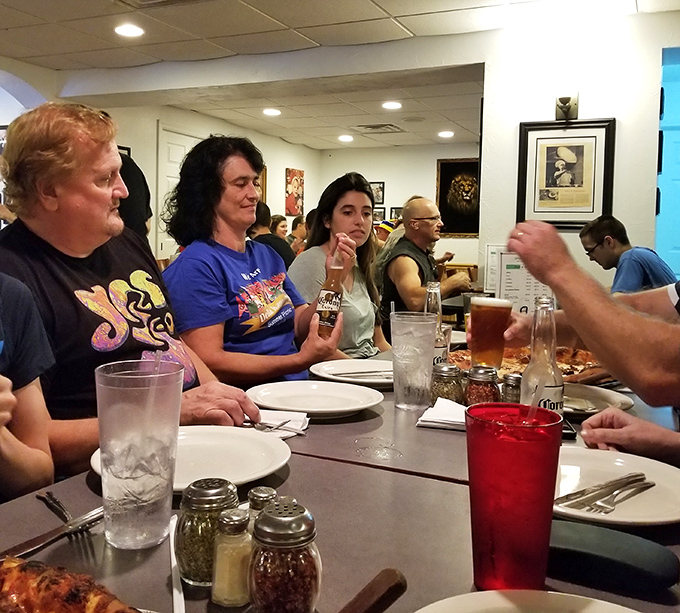 The universal language of pizza brings people together, creating conversations and connections that last long after the last slice disappears.